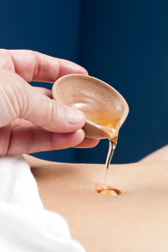 Here’s what you need to know about navel oiling, according to an ...